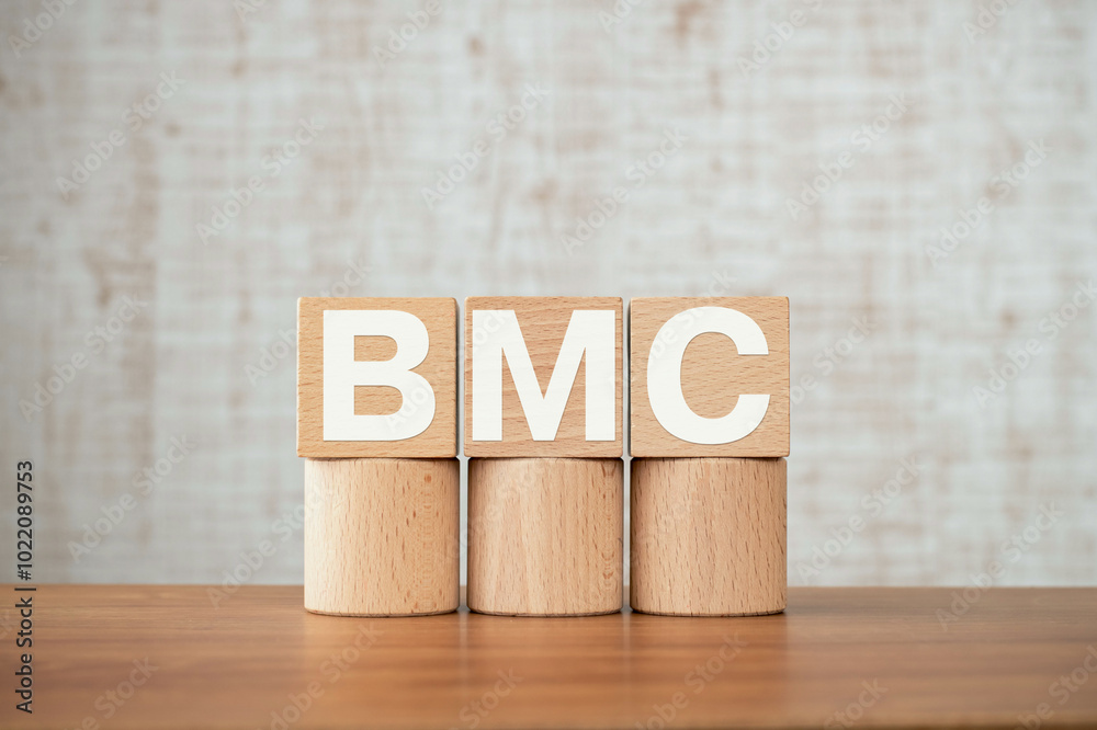 There is wood cube with the word BMC. It is an abbreviation for ...