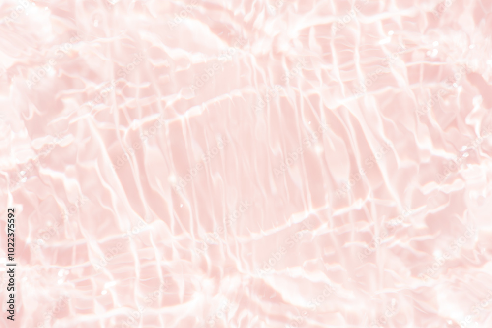 Pink water bubbles on the surface ripple. Defocus blurred transparent ...