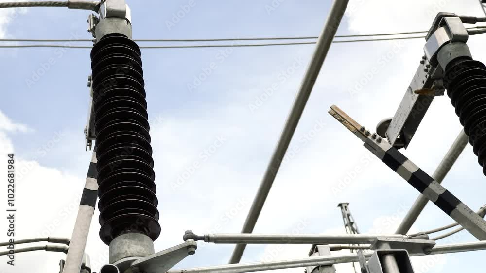 High voltage electrical substation. Power plant with high poles and ...