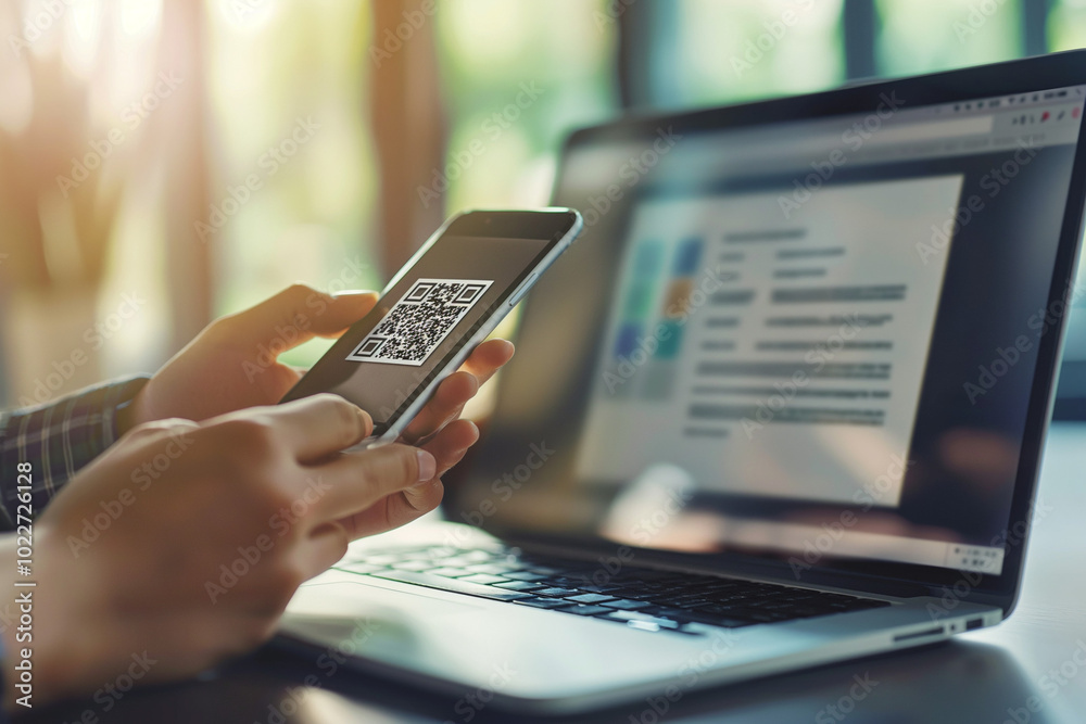 Scanning QR Code for Multi-Factor Authentication on Laptop Screen ...