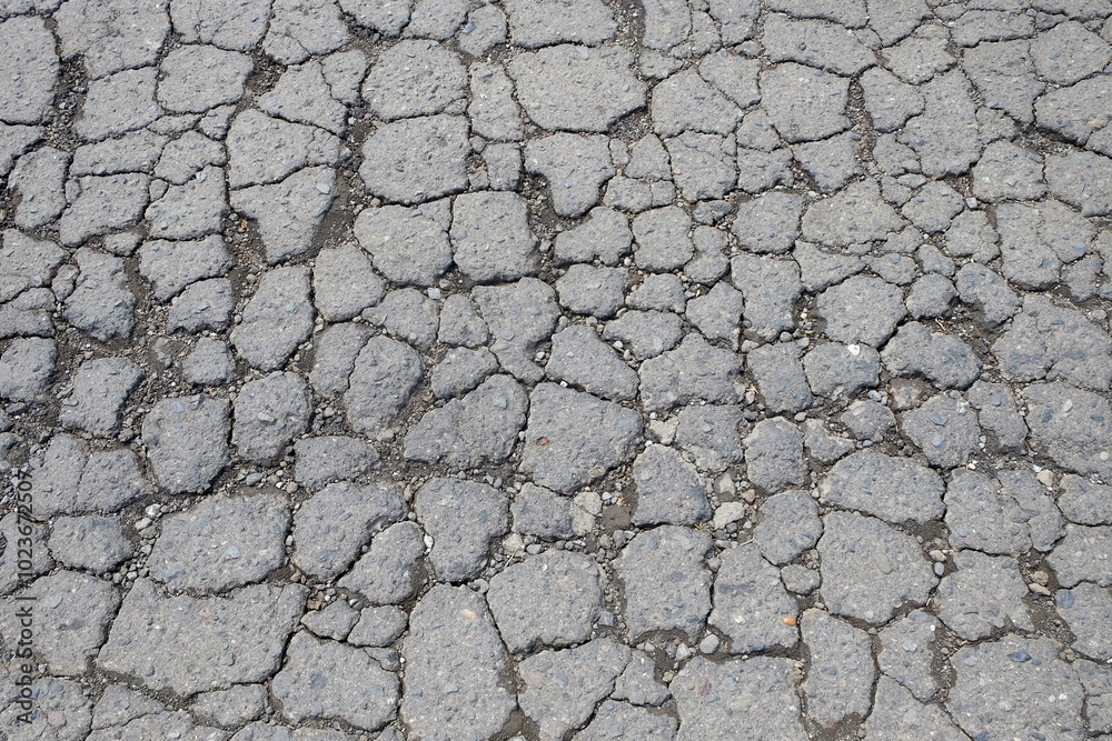 Abstract shapes, patterns and textures of cracked asphalt roads.Damaged ...