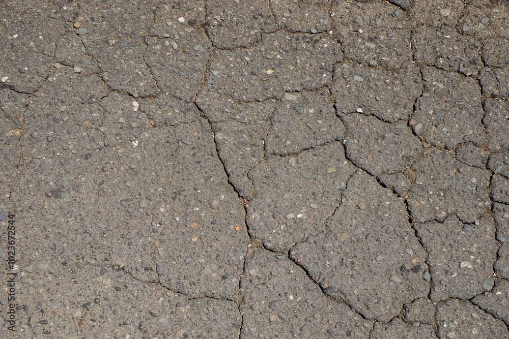 Abstract shapes, patterns and textures of cracked asphalt roads.Damaged ...