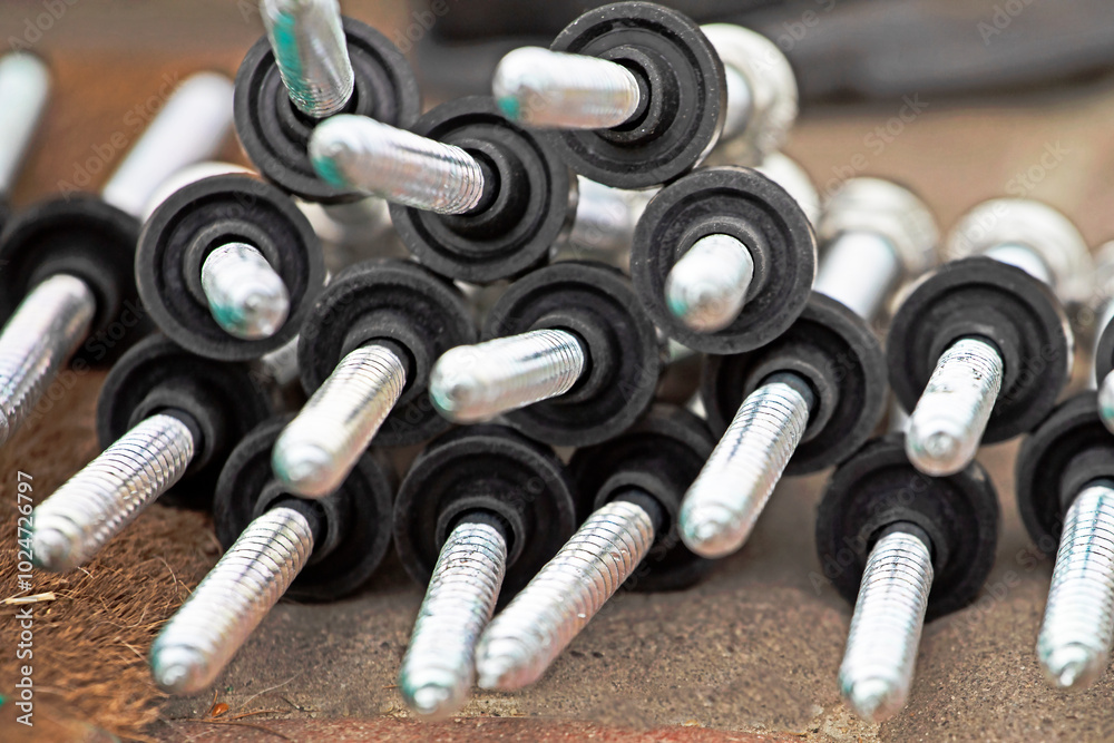 screws and bolts for mounting solar panels on the roof. Ecological ...