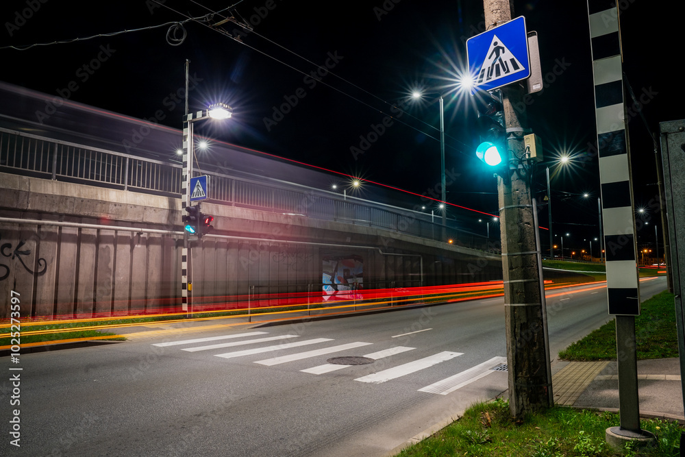 Long exposure photo of pedestrian walkway crossing and signs and ...