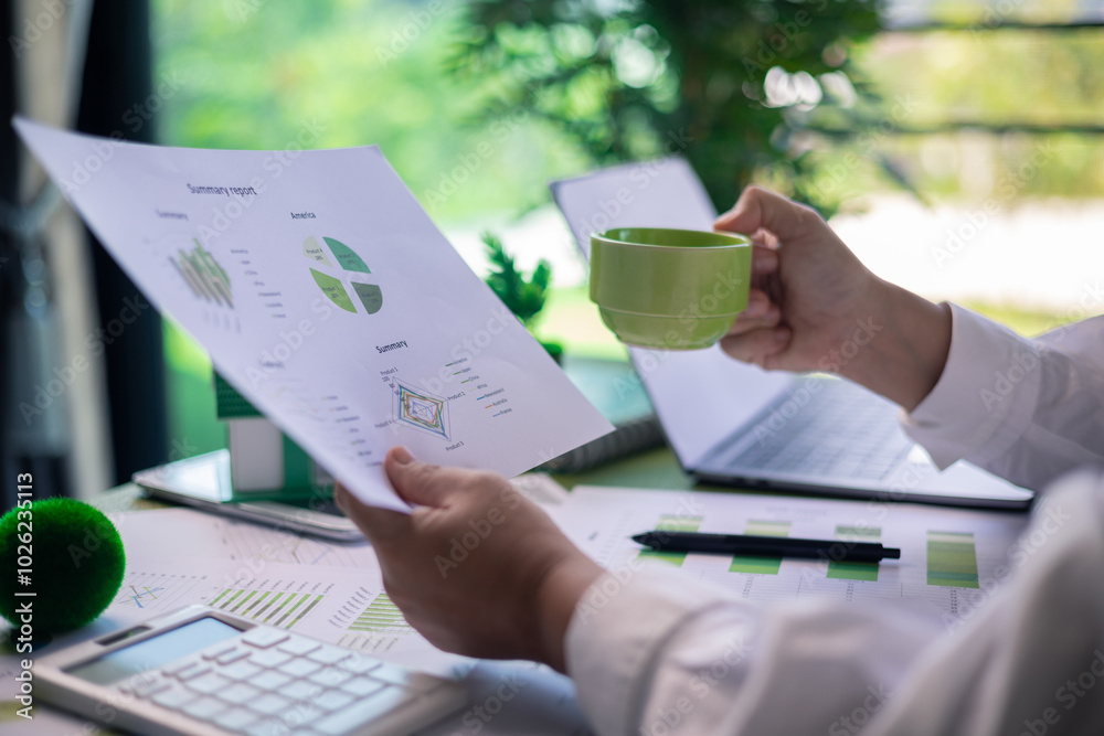 Analyzing green building performance metrics during business meeting ... Analyzing green building performance metrics during business meeting ...