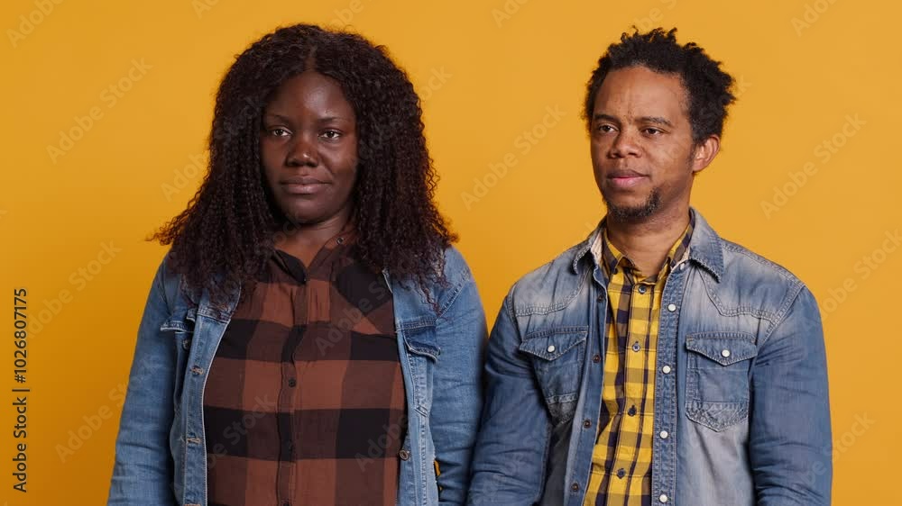 African american married couple showing the three wise monkeys sign in ...