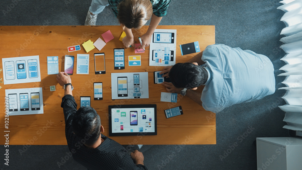 Top view of smart Ui designer brainstorming and planning about Ux Uo ...