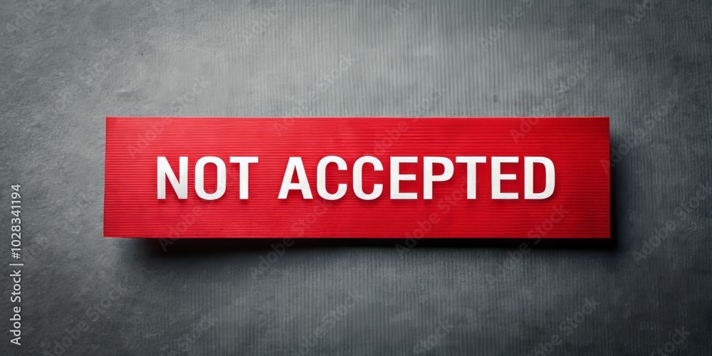 Fashion Photography of a Bold Red Label with 'Not Accepted' Text on a ...