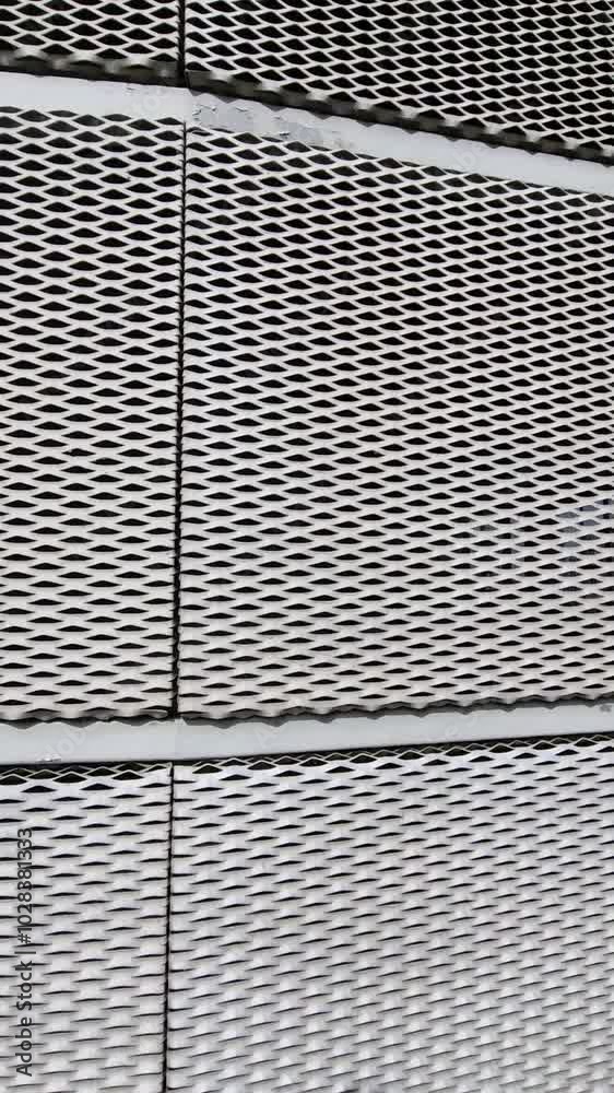 steel cladding of a building with a expanded metal lattice structure ...
