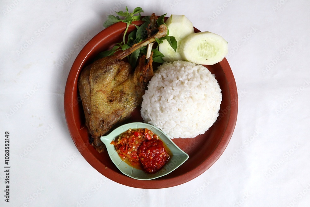 Penyet ayam or fried chicken in Indonesia is the name of a typical ...