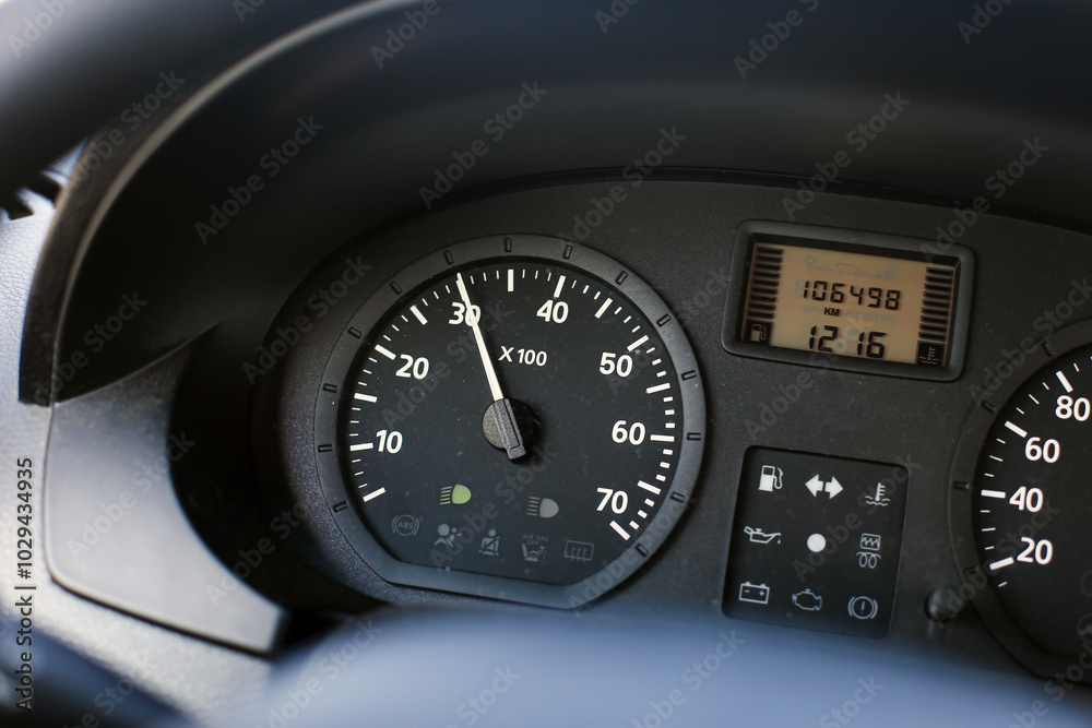 Tachometer in a car showing 3000 RPM. Engine performance indicator on ...
