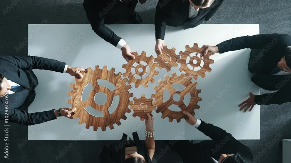 Top view of smart business people gather wooden cog together at meeting ...