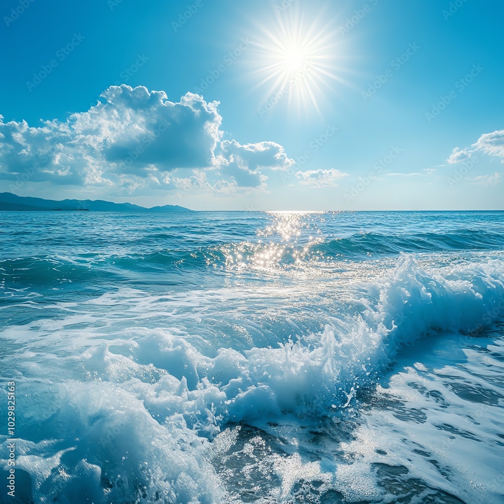 Turquoise ocean waves reflecting the bright sunlight with white foam ...