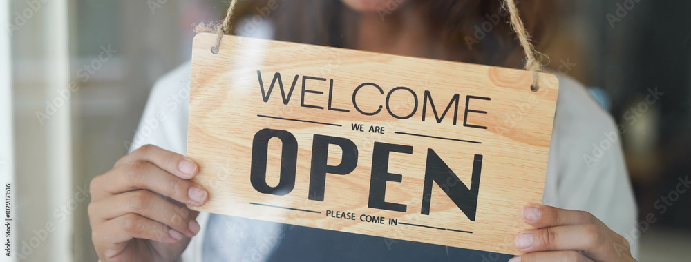 Owner retail shop turning sign board to open store after close lockdown ...