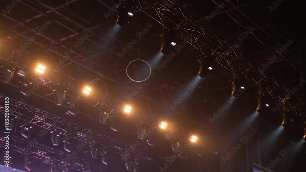 The ceiling of the film studio with many lighting fixtures installed on ...