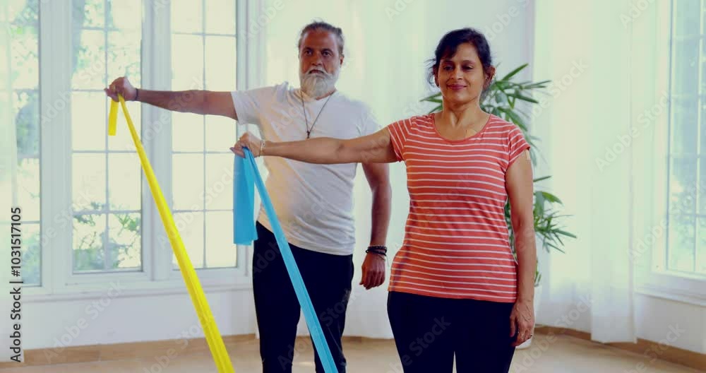 Happy Indian Asian mid aged fitness enthusiast couple in their fifties ...