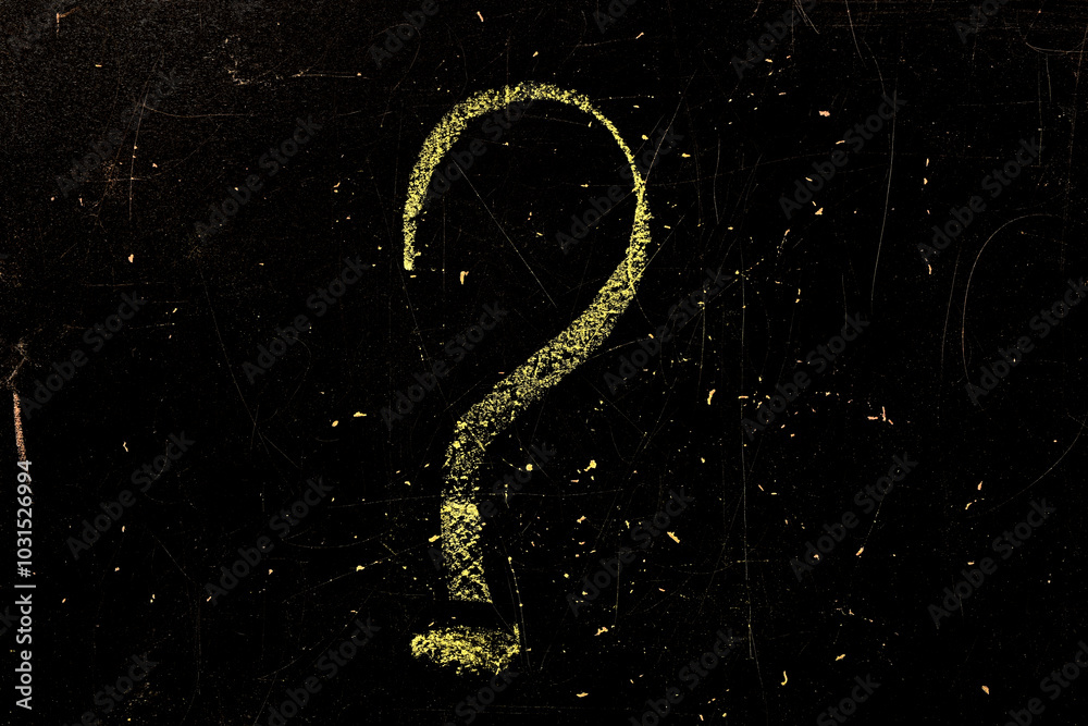 English alphabet. Question mark written with chalk on a black surface ...
