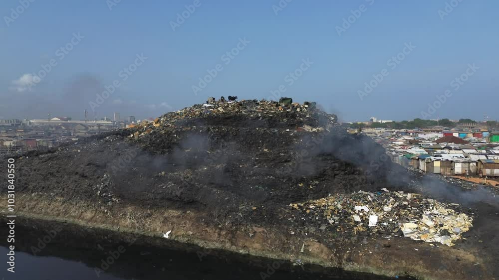 Ghana, Accra, AGBOGBLOSHIE drone view Odaw River the largest landfill ...