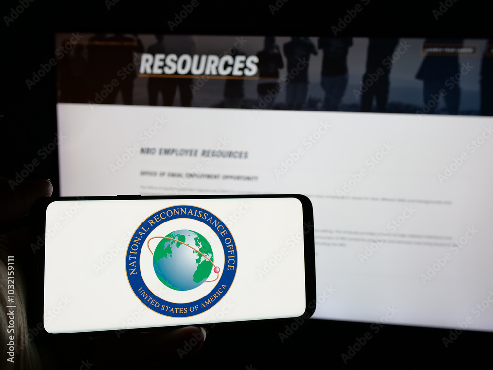 Stuttgart, Germany - 2024-10-10: Person holding smartphone with logo of ...