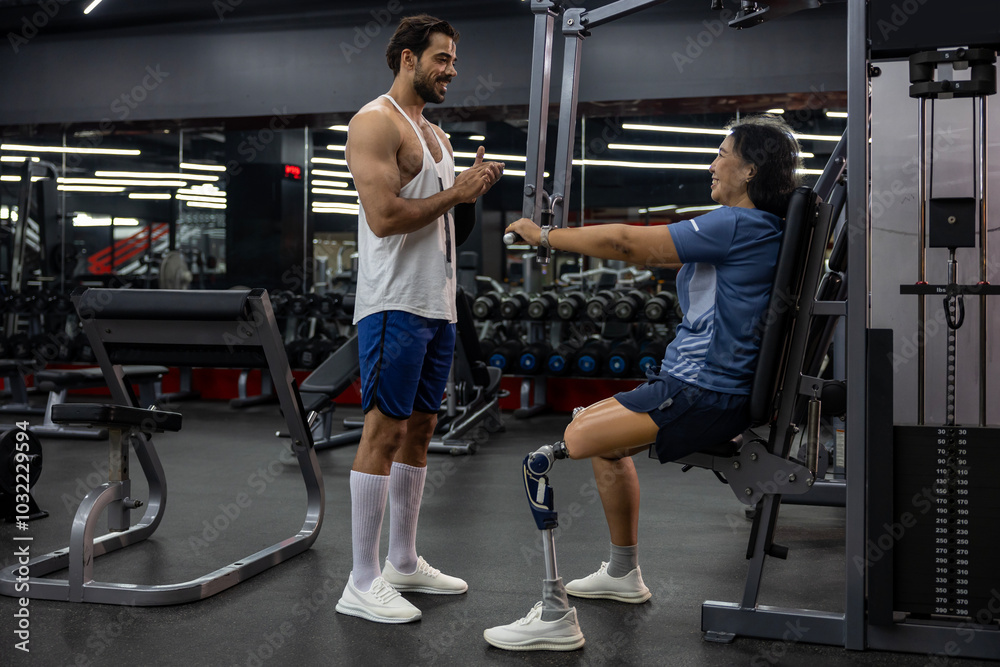 Asian woman with prosthetic leg from amputation from doing weight ...