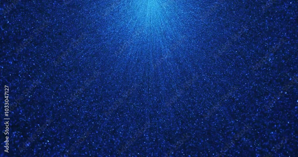 Intense data stream effect with dense blue particles radiating from a ...