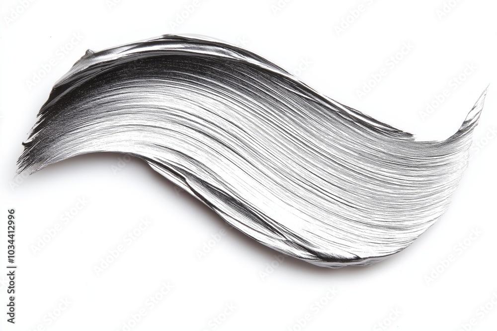 Metallic silver paint stroke on a white background, showcasing a smooth ...