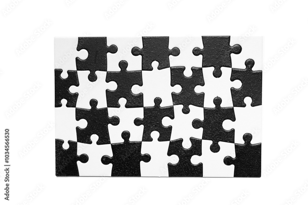 A jigsaw puzzle with black and white pieces. The puzzle is made up of ...