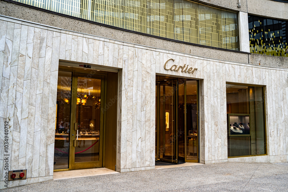 Cartier logo store sign. Cartier is a French luxury-goods conglomerate ...