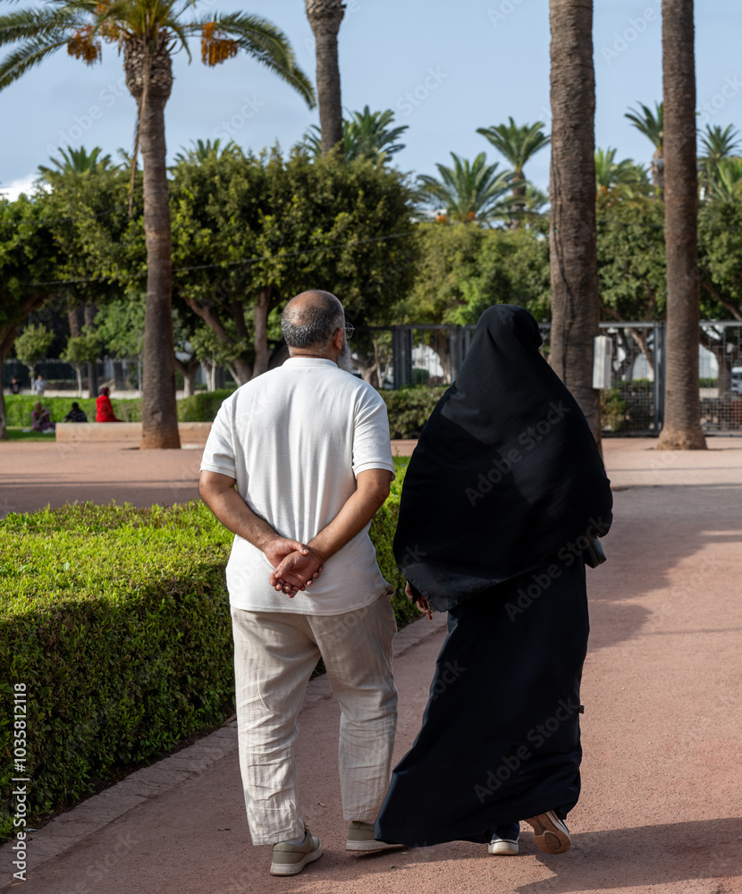 Casablanca, Morocco. Moroccan middle aged couple walking in the parc de ...