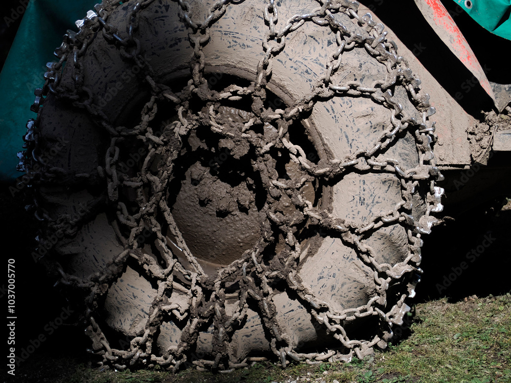 tractor tires with chains for mud. The detail of the wheels and tires ...