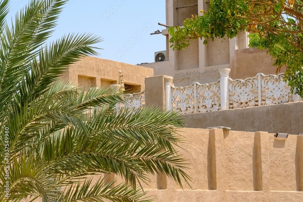 Traditional Arabic house with wind catcher tower or Barjeel for cross ...