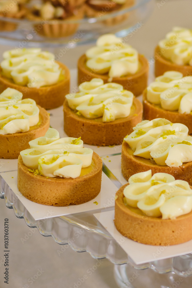 Lemon tart on the candy bar. Table with sweets, candies, dessert. Stock ...