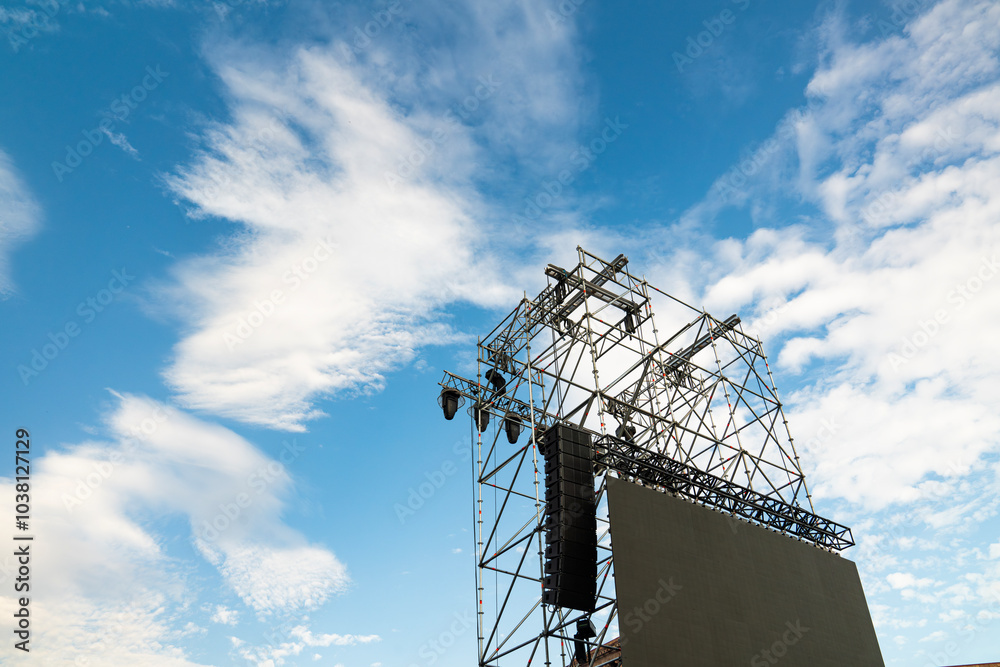 Overhead stage rigging equipment Concert stage with outdoor lighting ...