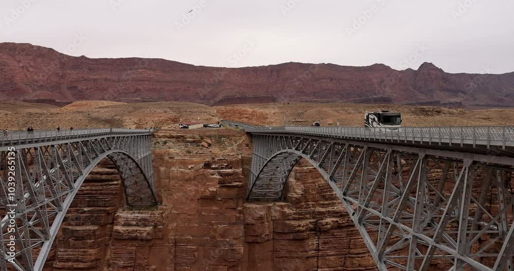 Navajo Bridge Arizona Condors flying over traffic endangered. Upstream ...