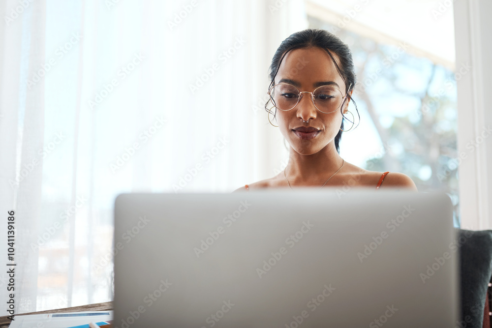 Typing, creative and woman with laptop, home and freelancer with ...