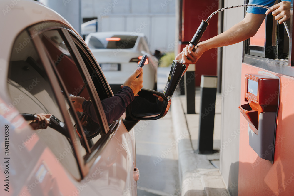 Men scan and pay for food, pick up food from a drive-thru counter and ...