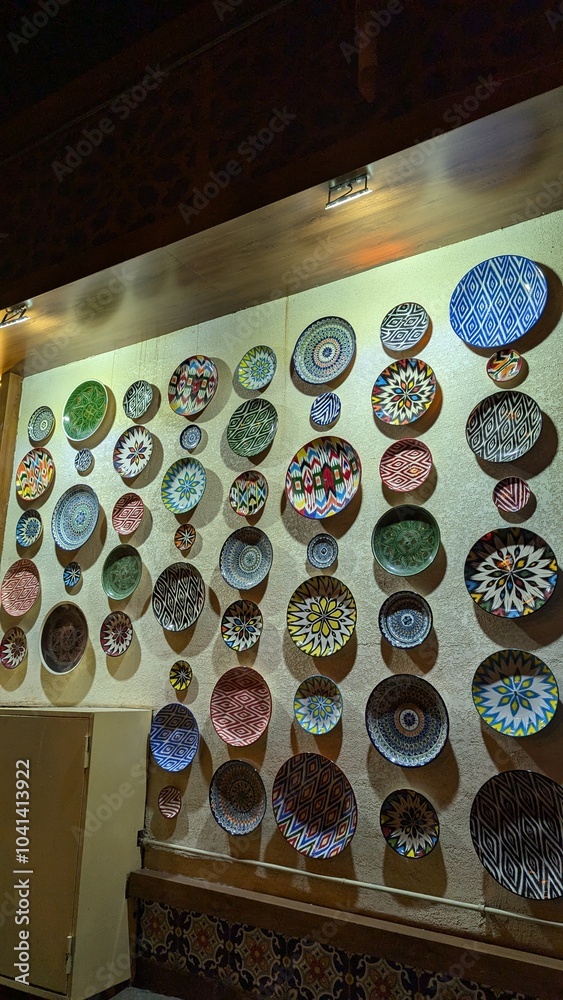 plates hanging on the wall with tajik traditioma painting Stock Photo ...