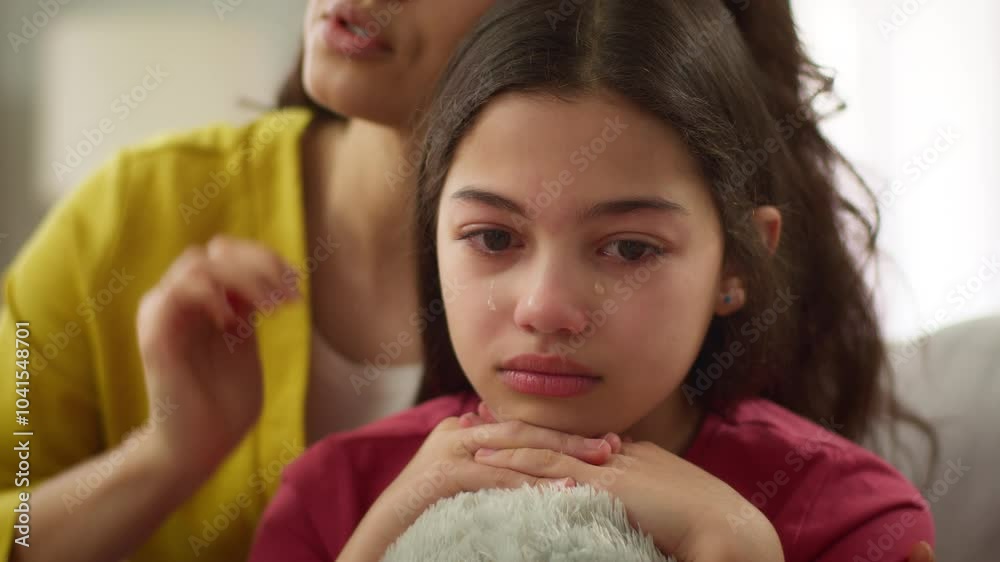 Close up Caucasian crying sad anxious depressed little girl child kid ...