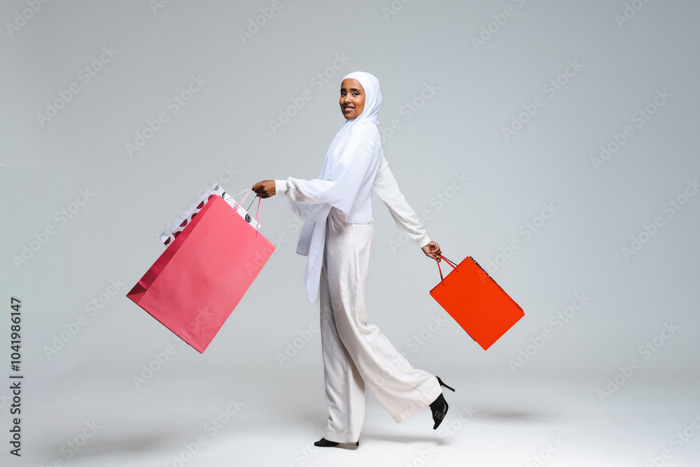 Beautiful arab middle-eastern woman with traditional abaya in studio ...