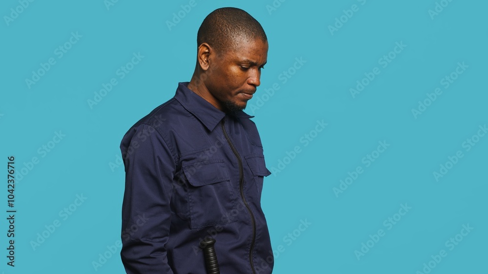 Cheerful security guard celebrating achievements during protection job ...
