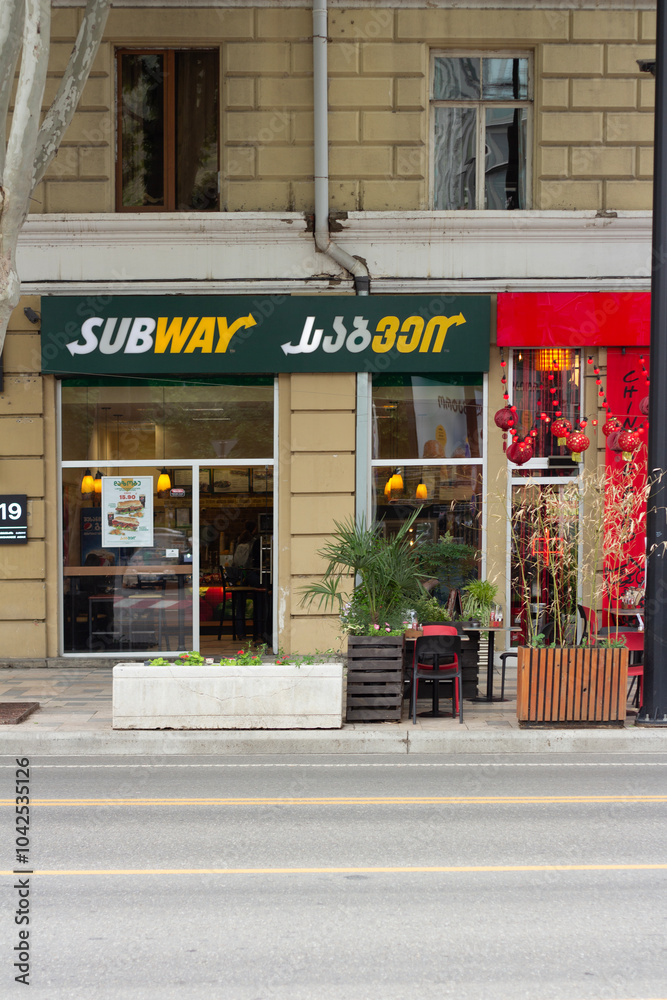 Tbilisi, Georgia - May, 27, 2024: Vertical street photo. Logo of ...