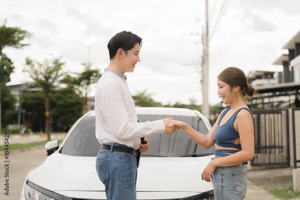 Romantic Car Handoff: A loving couple shares a tender moment as the man ...