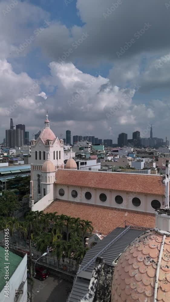 Church in high density urban area aerial rooftop view with city skyline ...