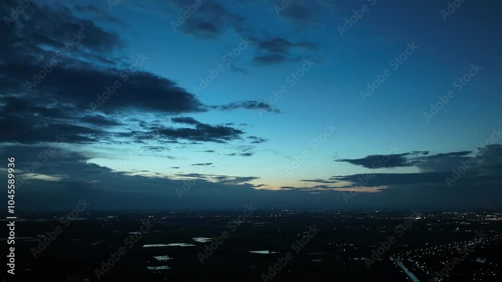 Forwards fly above modern metropolis with illuminated skyscrapers and ...