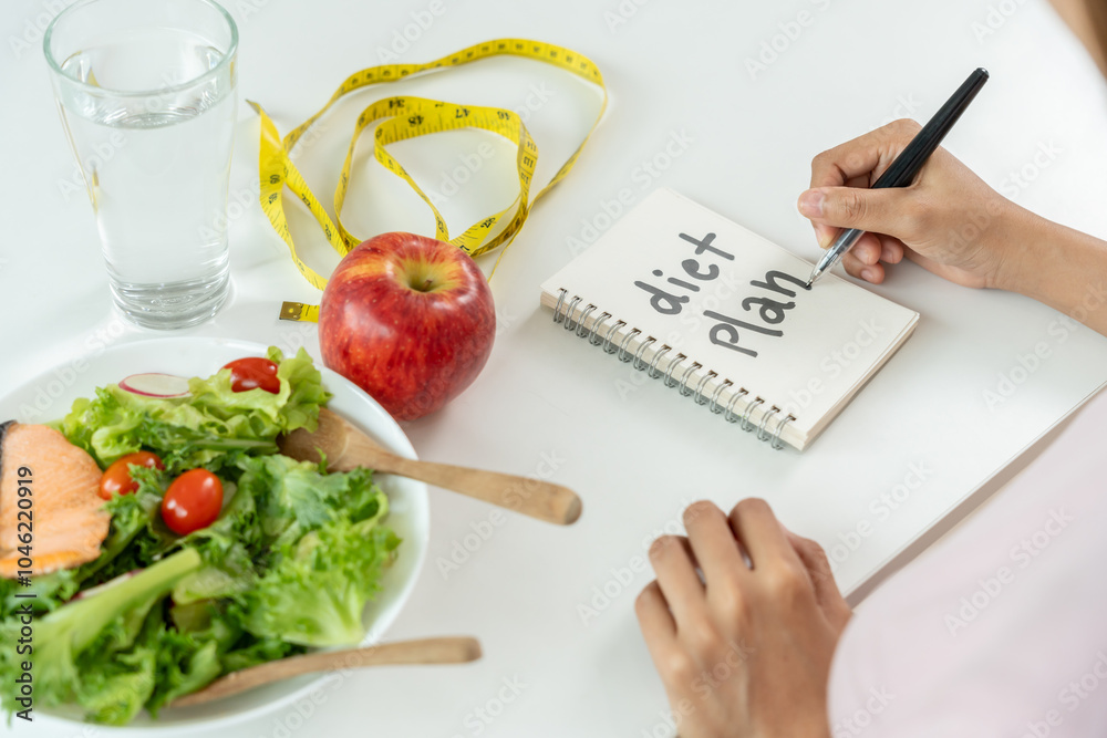 Diet and dieting. Beauty slim female body writing diet plan for healthy ...