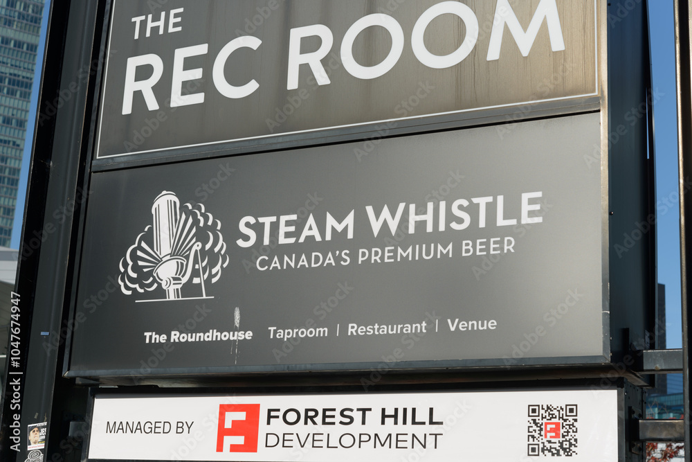 sign featuring The Rec Room and Steam Whistle at Roundhouse Park ...