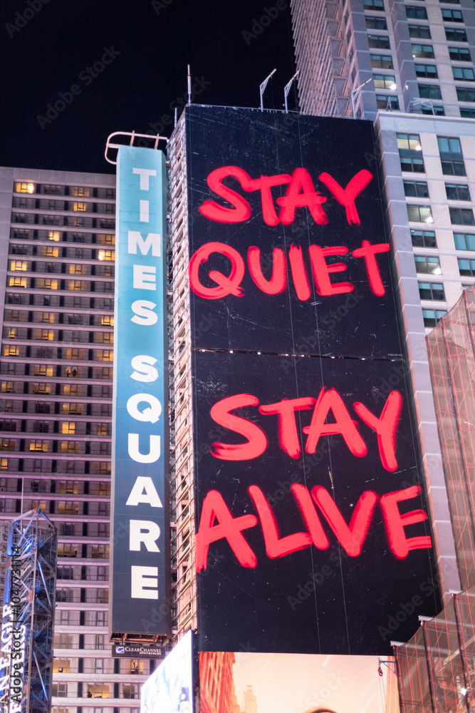 New York City, NY - USA: Red and black Stay Quiet, Stay Alive banner ...