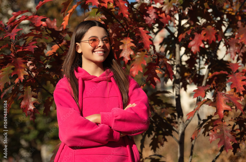 Autumn leaves in park outdoor. Girl portrait. Autumn teen girl wearing ...