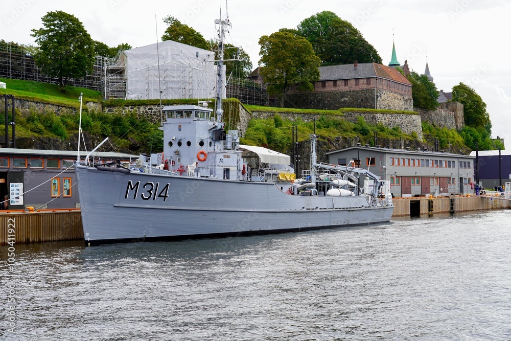 Decommissioned minesweeper KNM Alta moored beneath Akershus Fortress in ...