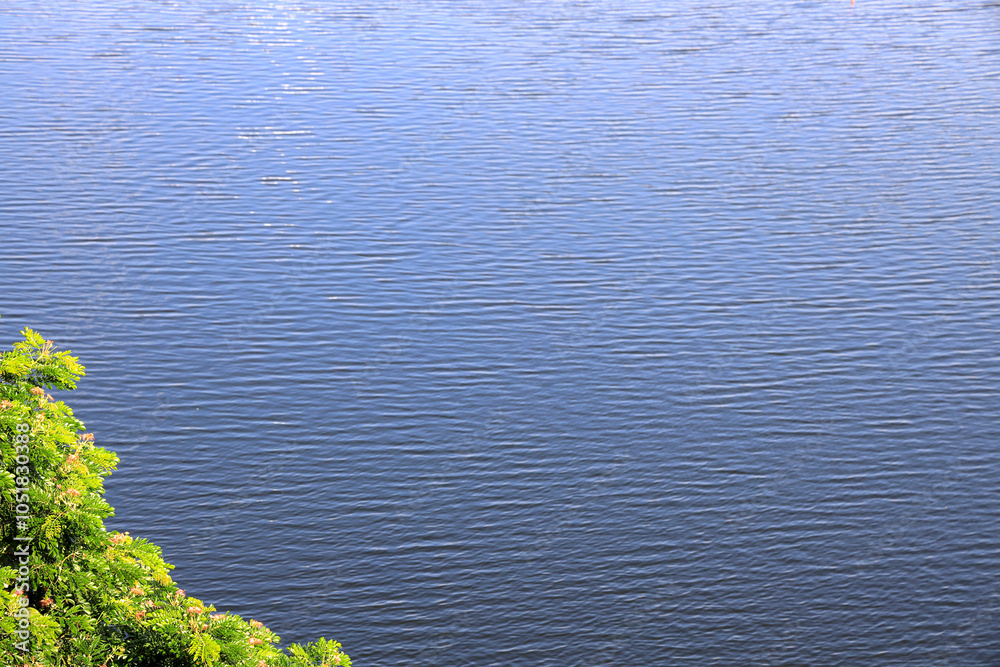Water surface background with sun reflections. Aerial view of Waves on ...